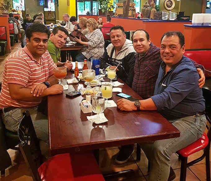 Good food brings people together, turning strangers into friends over plates of perfectly fried seafood.