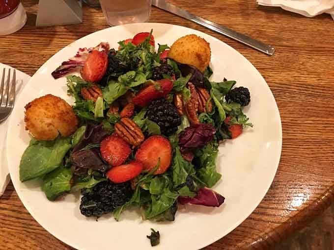 This salad brings together nuts, berries, and greens like a produce section threw the world's tastiest party.