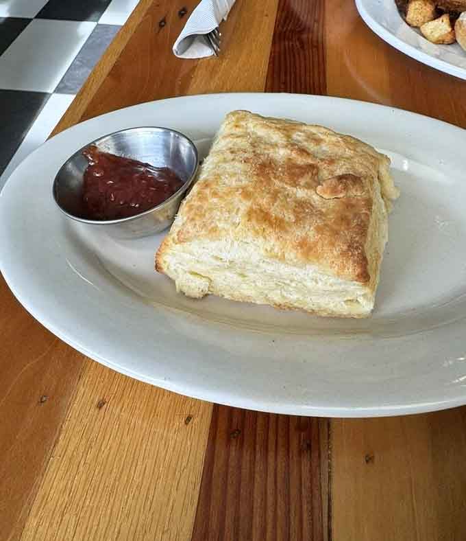 A buttermilk biscuit so flaky and golden, it could make a grown person weep tears of carbohydrate joy.