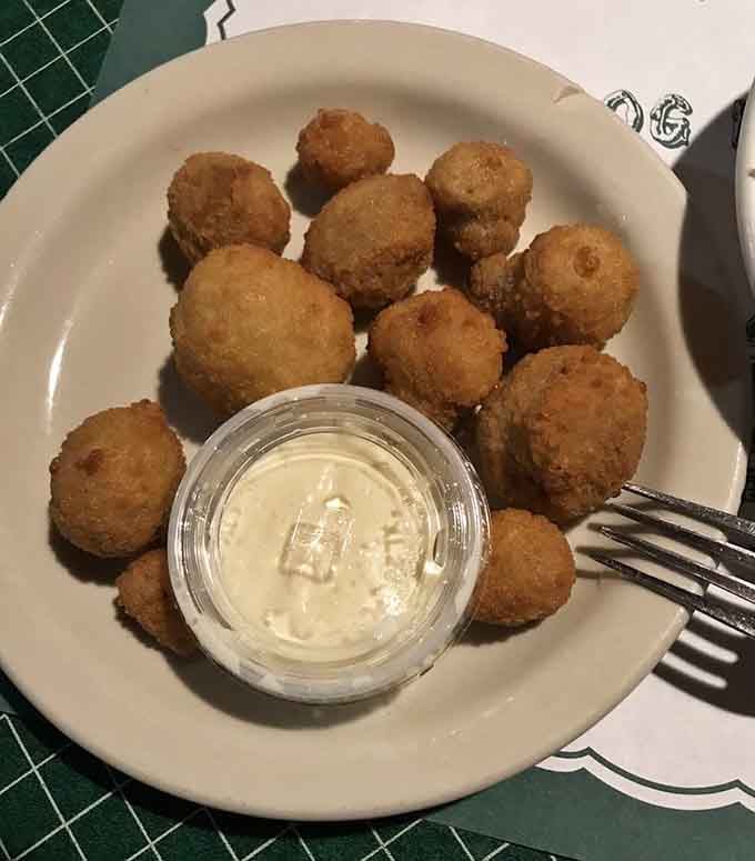 Fried mushrooms with a crispy coating that protects the tender interior like edible bubble wrap, served with creamy dipping sauce.