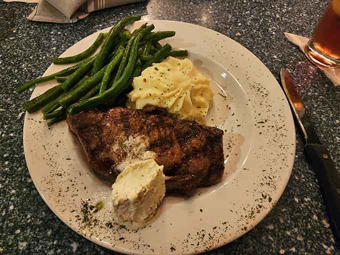 A beautifully charred steak with creamy potatoes and green beans proves they handle land-based proteins as masterfully as seafood.