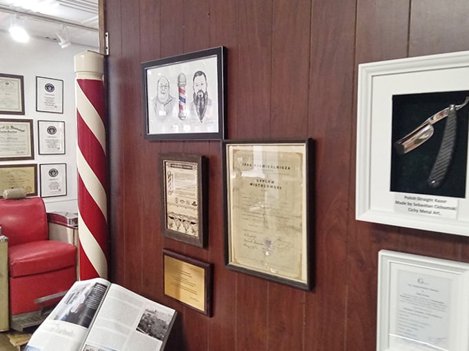 Wall displays packed with vintage signs and memorabilia prove that barbers were master marketers long before social media existed.