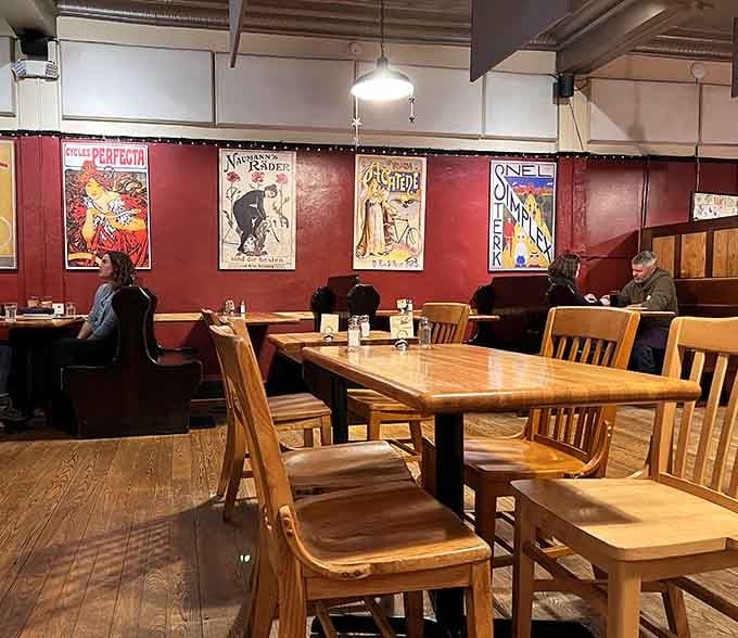 Vintage advertisements line the walls while diners settle into booths that have witnessed countless conversations and celebrations.