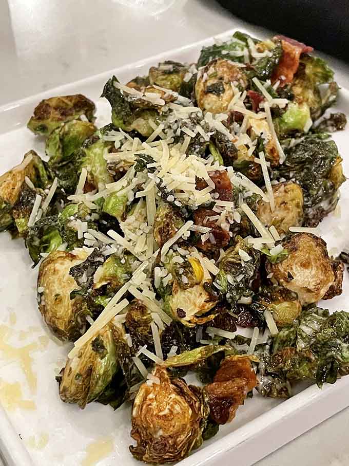 Brussels sprouts transformed from childhood nemesis to crispy, bacon-studded heroes covered in parmesan glory.