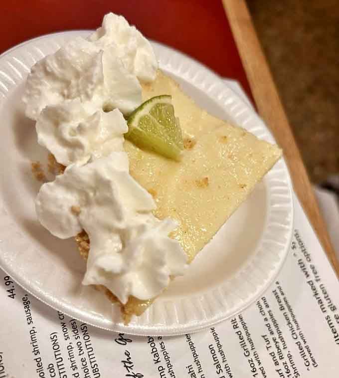 Key lime pie with enough whipped cream to make your cardiologist nervous but your taste buds ecstatic.