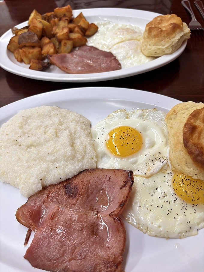 Two eggs, country ham, grits, and a towering biscuit create the kind of breakfast that fuels legends and long days.