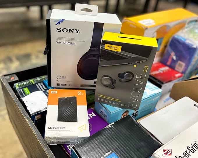 Sony headphones sitting casually in bins like they didn't cost serious money at regular stores yesterday.