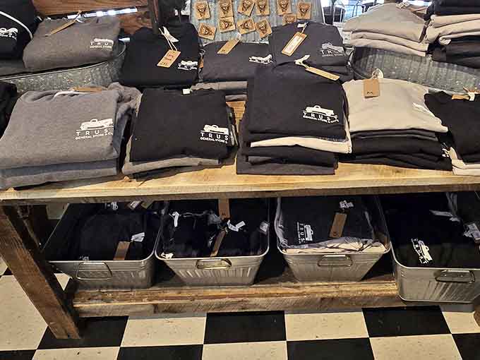 Locally branded merchandise stacked neatly on rustic tables makes souvenir shopping feel less touristy and more like supporting your neighbors.