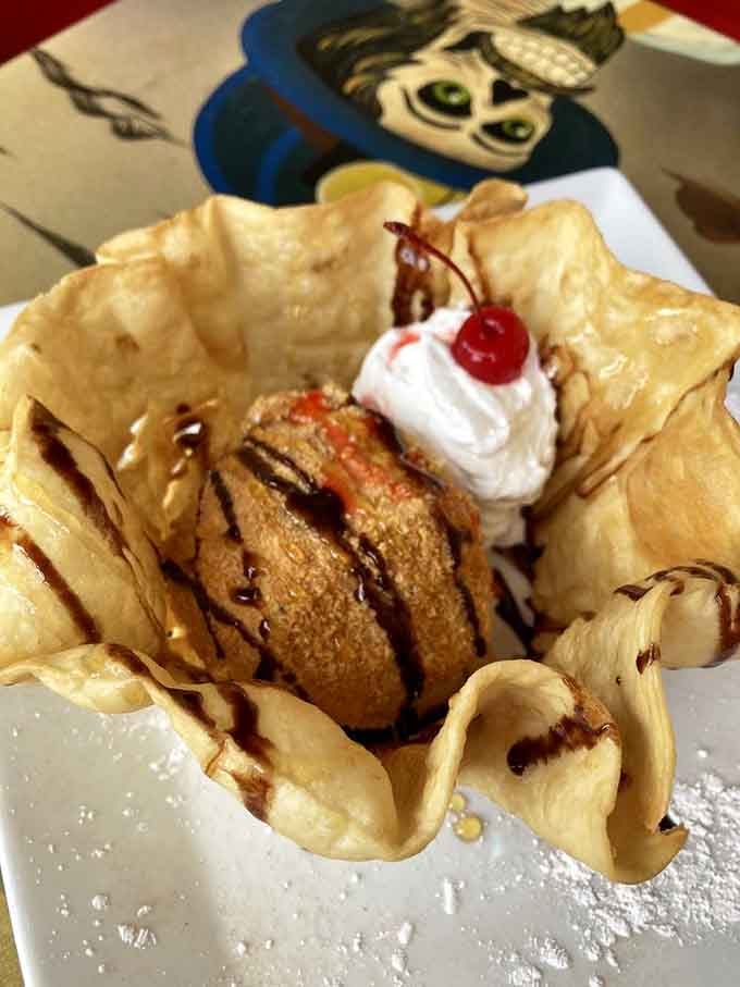 Fried ice cream that defies the laws of physics and common sense, proving that sometimes impossible things are also the most delicious.