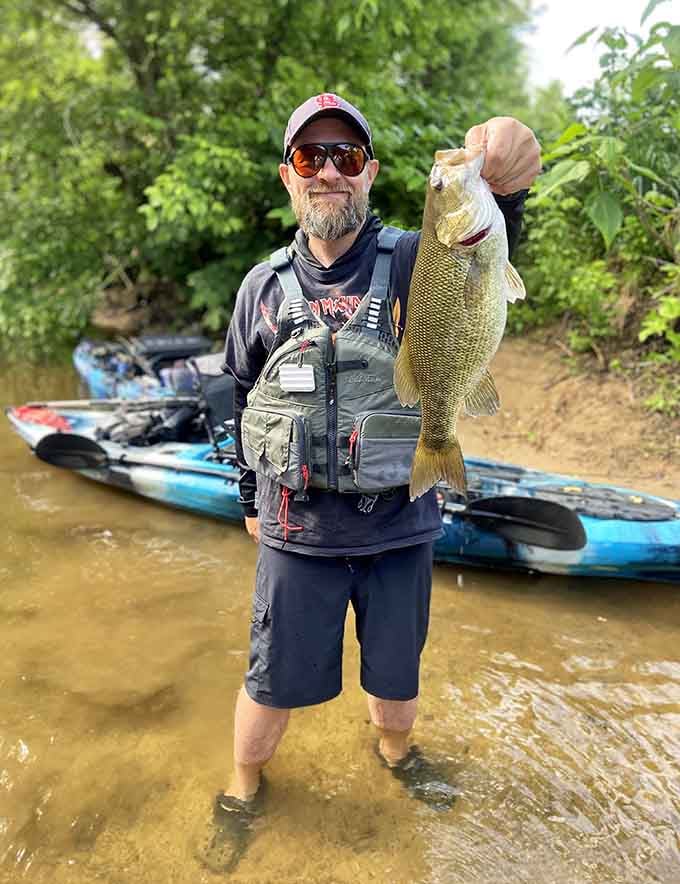 That smile says everything about landing a keeper on the Big River's productive waters.