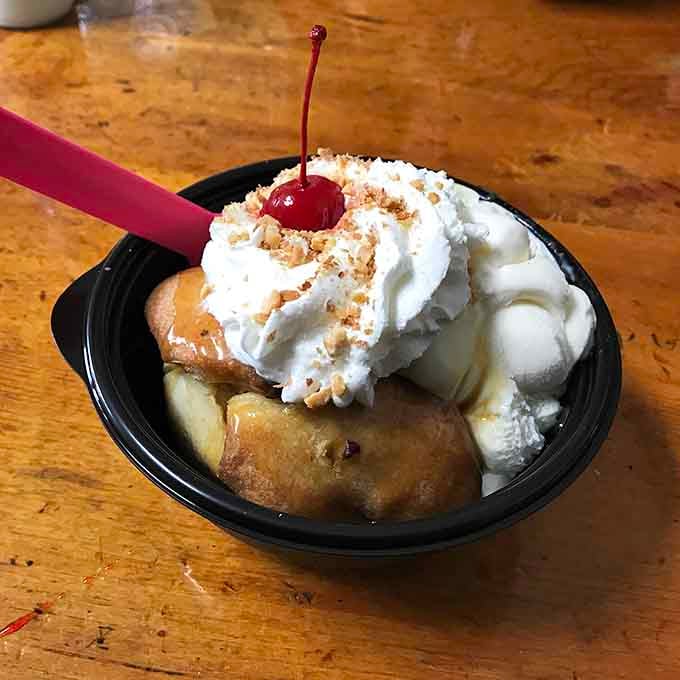 Apple dumpling done right, with multiple scoops and toppings, is basically happiness served in an oval dish.