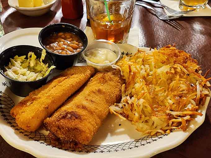 Friday fish fry featuring golden walleye, hash browns, and all the fixings your grandparents would enthusiastically approve of.