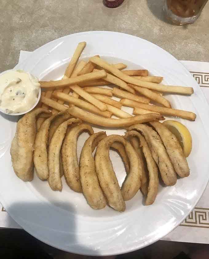 Perfectly fried perch with golden fries and bratwurst is the kind of meal that makes you understand why people love the Great Lakes.