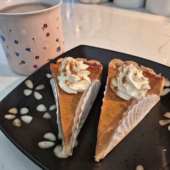 Sweet potato pie slices with whipped cream peaks that could make a grown person weep with anticipation and nostalgia.