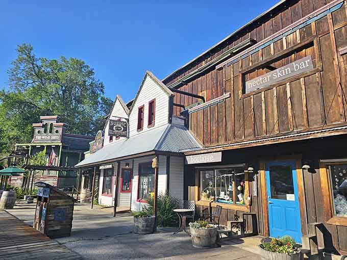 Wooden boardwalks connecting charming storefronts create the perfect setting for discovering treasures you didn't know you absolutely needed today.