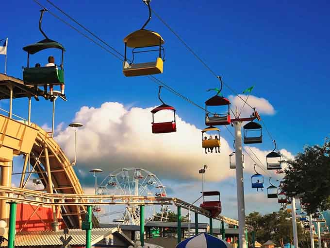 The sky ride glides overhead in cheerful colors, offering bird's-eye views without the feathers.