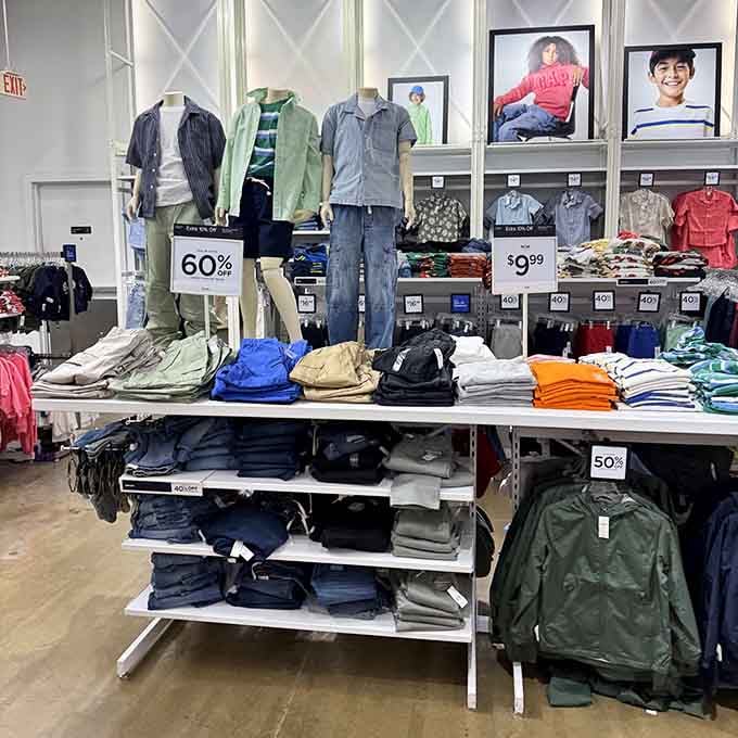 Discount signs on children's clothing make parents everywhere breathe easier about inevitable playground stains and tears.