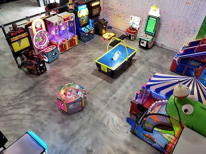 Classic arcade games lined up like old friends waiting to take your tickets and your competitive spirit.