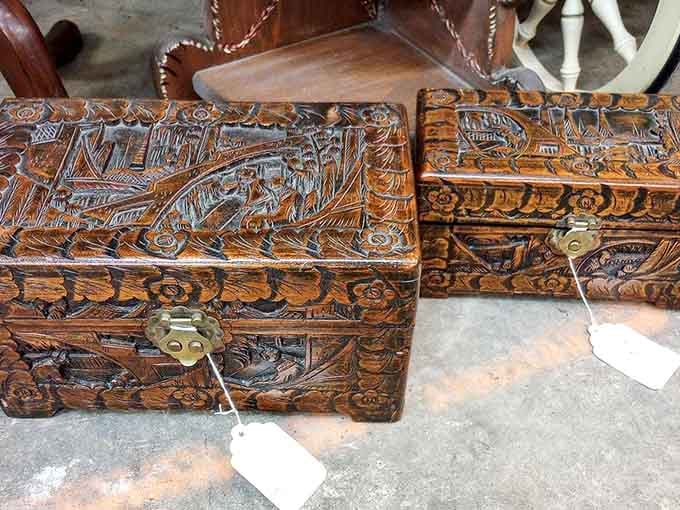 Hand-carved wooden boxes that once held precious keepsakes and secrets from another era entirely.