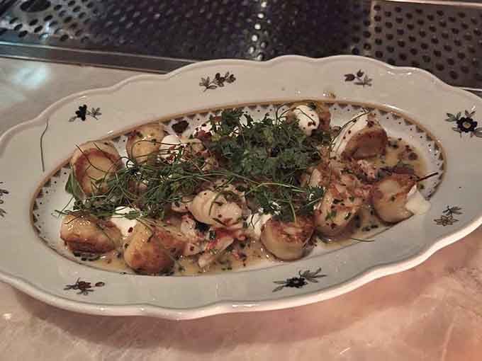 Lazy lobster dumplings swimming in sauce, because sometimes luxury means not having to crack shells while wearing your nice clothes.