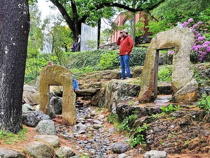 These rain gate sculptures create natural doorways that transform a simple walk into an architectural adventure through art.