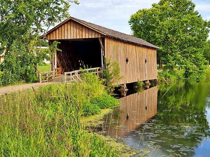 The mirror-like water reflection doubles the bridge's beauty, giving you two historic landmarks for the price of one.