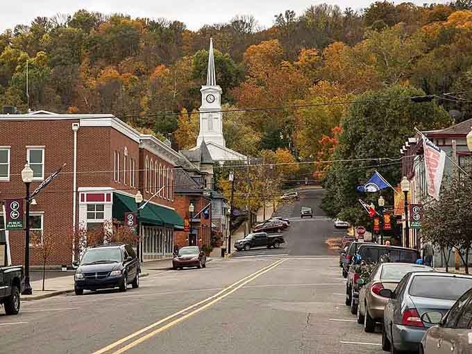 That white steeple rising above autumn foliage creates a scene Currier and Ives would've fought to paint.