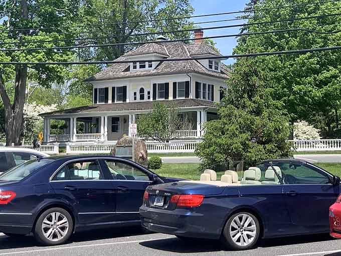This gracious home with wraparound porch practically begs you to sit with lemonade and watch the world gently pass by.