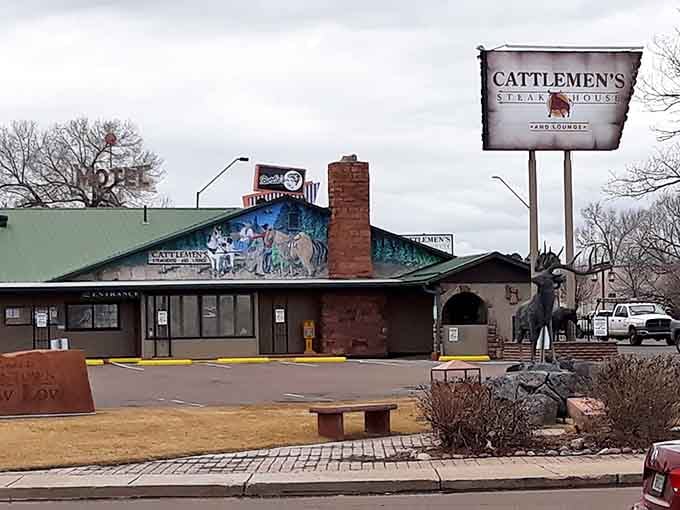 The vibrant mural celebrates ranching heritage while the kitchen inside honors it with perfectly grilled steaks.