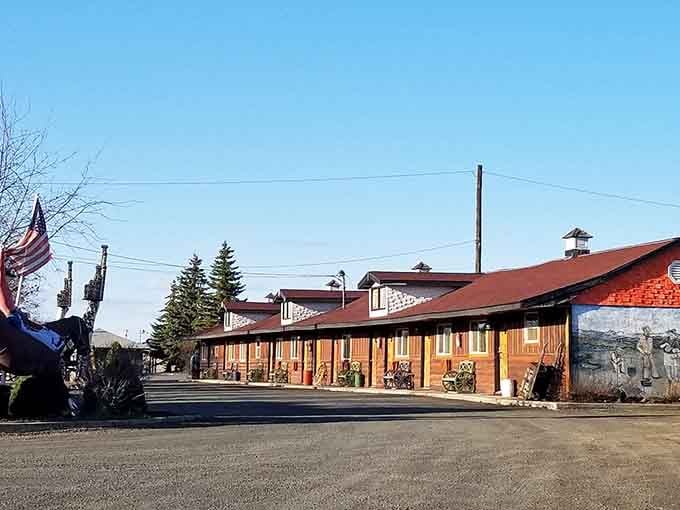 This classic motel with its distinctive roofline and patriotic flag welcomes travelers to experience authentic small-town hospitality firsthand.