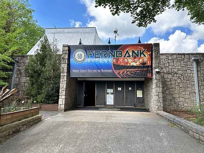 Stone walls and bold signage mark the entrance to scientific adventures that sparked countless young imaginations.