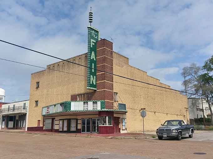 That vintage theater marquee towers over downtown like a beacon calling movie lovers and food enthusiasts alike.