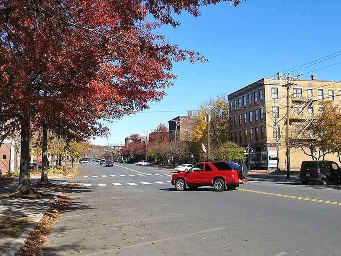 Brilliant fall colors paint the wide boulevards where historic buildings stand proud against crisp autumn skies.
