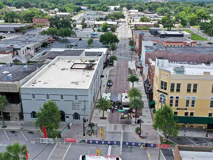 The mix of architectural styles tells decades of history, from vintage brick facades to cheerful painted buildings bursting with personality.