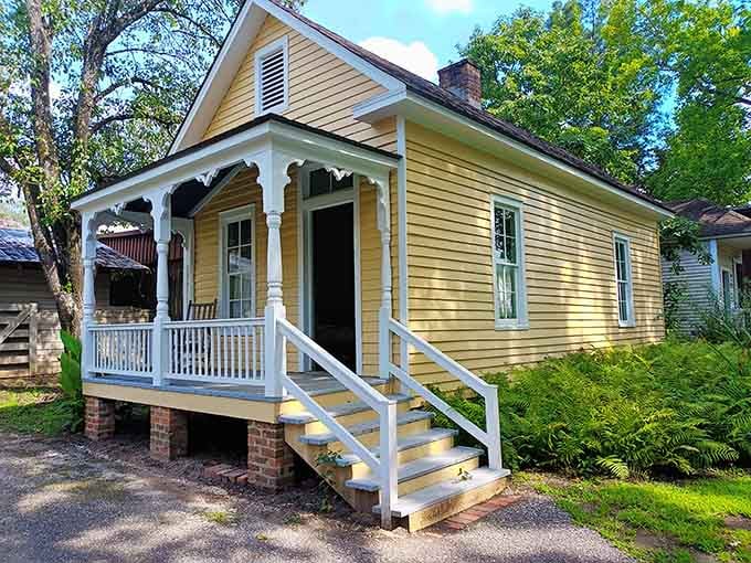 This cheerful yellow cottage with its welcoming porch looks ready to tell stories from a century of Southern living.