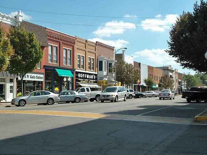 Main Street shops with actual character, where Hoffman's sign promises the kind of service your parents remember fondly.