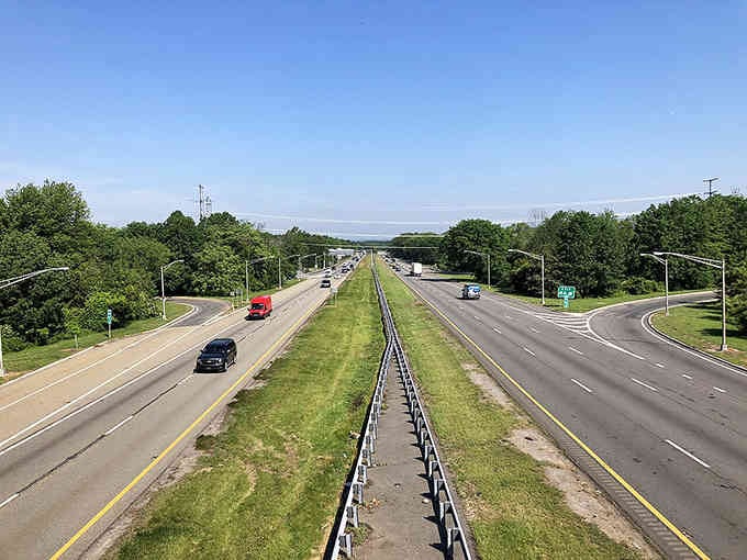 Modern highways cut through lush greenery, proving you can have convenient access while staying surrounded by nature's beauty.