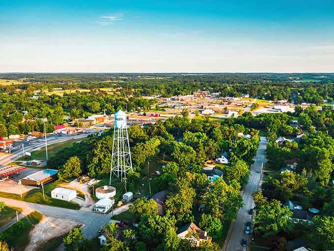 The classic water tower rises above the trees, a functional landmark that's become part of the town's identity.