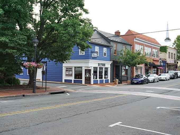 That bold blue corner building proves small-town main streets still know how to make a colorful first impression.