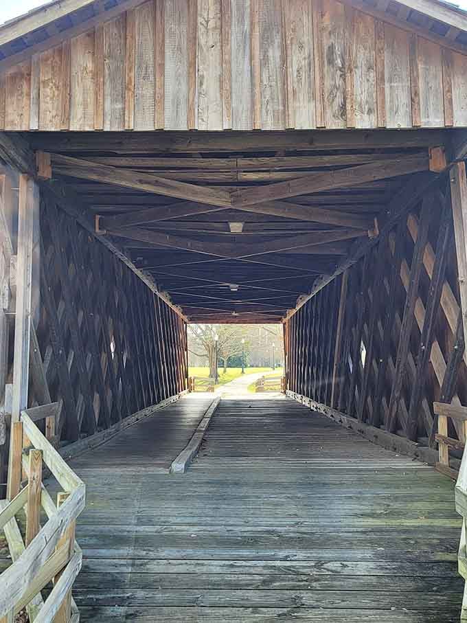 Peering through reveals layers of wooden craftsmanship that have stood strong through generations of Alabama weather.