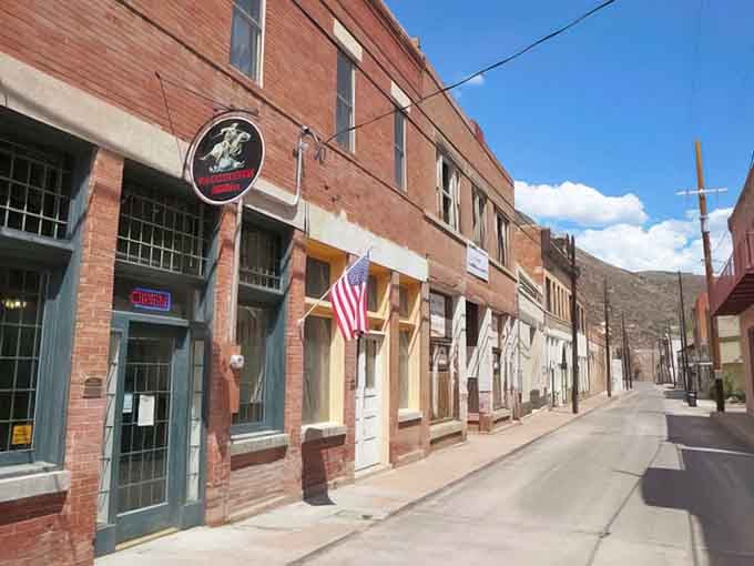 Brick storefronts and American flags line this quiet street where history isn't just preserved&mdash;it's still being lived.