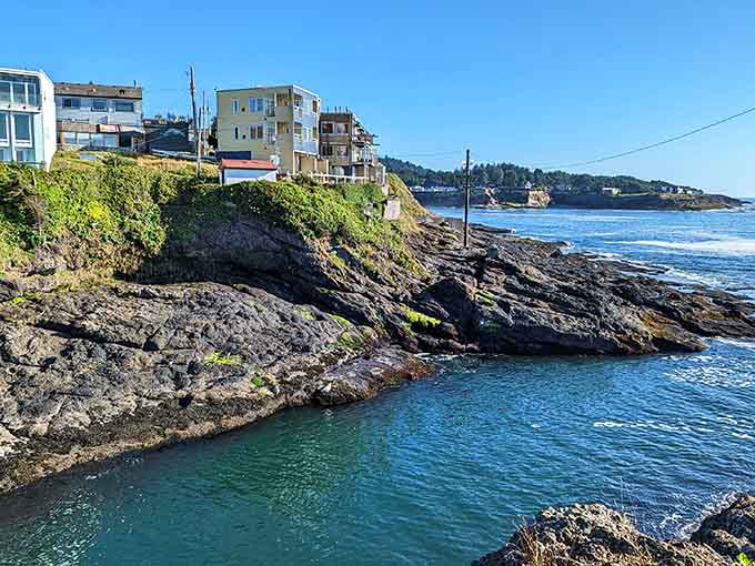 Beach houses cling to the cliffs above Depoe Bay, residents enjoying front-row seats to nature's show.