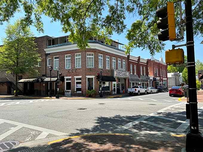 Brick storefronts with awnings create that timeless main street appeal that makes you want to park and explore.