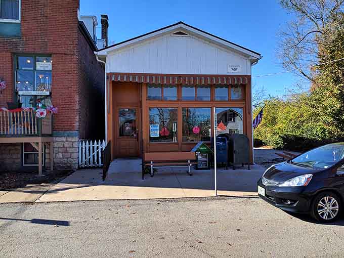 This charming storefront with its wooden garage-style doors invites you to discover whatever treasures hide behind that welcoming facade.