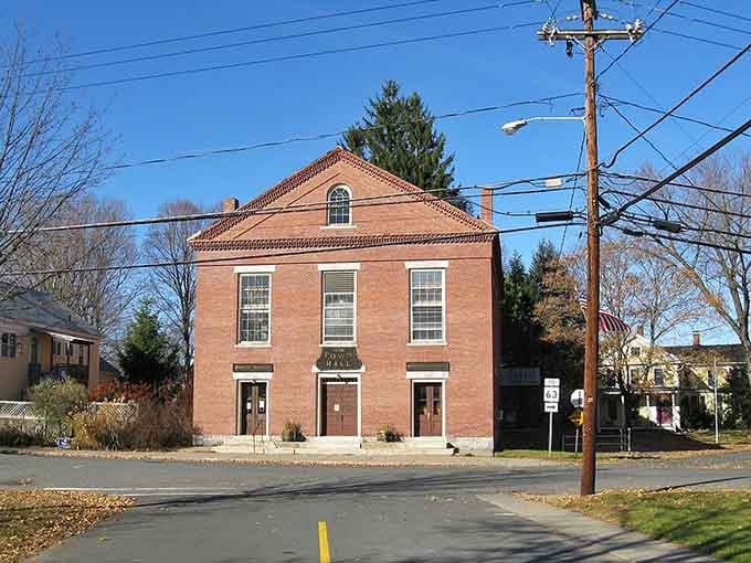 This handsome brick building anchors the neighborhood with Federal-style elegance that's stood strong for generations past.