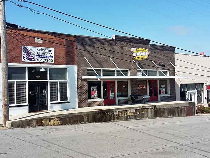This sidewalk building's simple facade shows the craftsmanship of an era when builders took real pride in details.