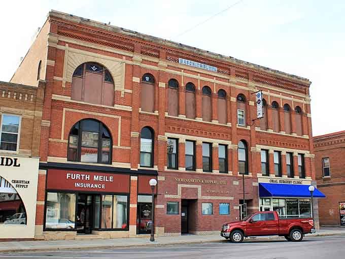 Those grand arched windows once lit opera house performances&mdash;now they watch over a thriving main street below.