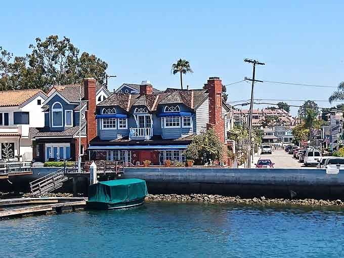 Colorful waterfront homes reflecting in the harbor prove that some neighborhoods are worth writing home about.