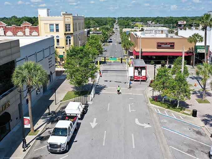 This bird's-eye view reveals a downtown designed for people, not just cars, with shaded sidewalks inviting leisurely afternoon strolls.
