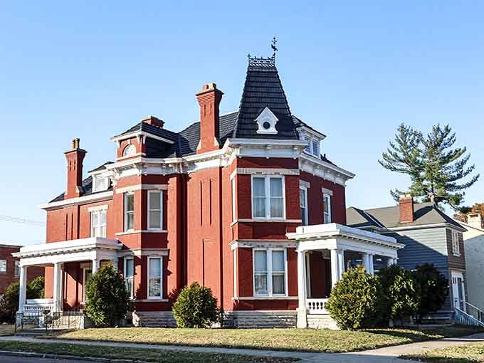 That red-brick mansion with its dramatic tower proves that retirement living can include serious architectural eye candy daily.